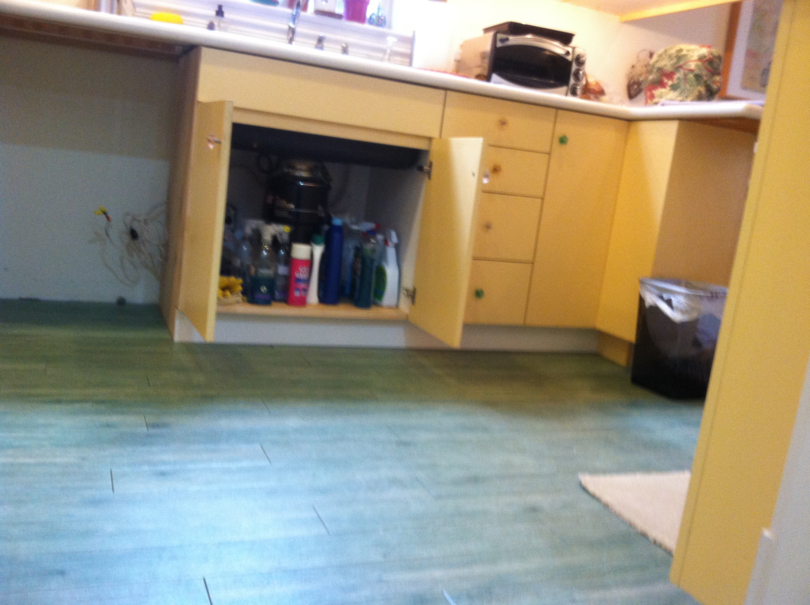 replacing a wet and rotten sink cabinet without removing the counter ...